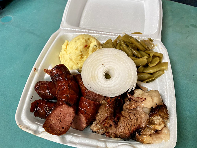 Green beans, potato salad, and sausage with that perfect snap&mdash;proof that in Texas, side dishes aren't afterthoughts but essential supporting characters in the barbecue drama.