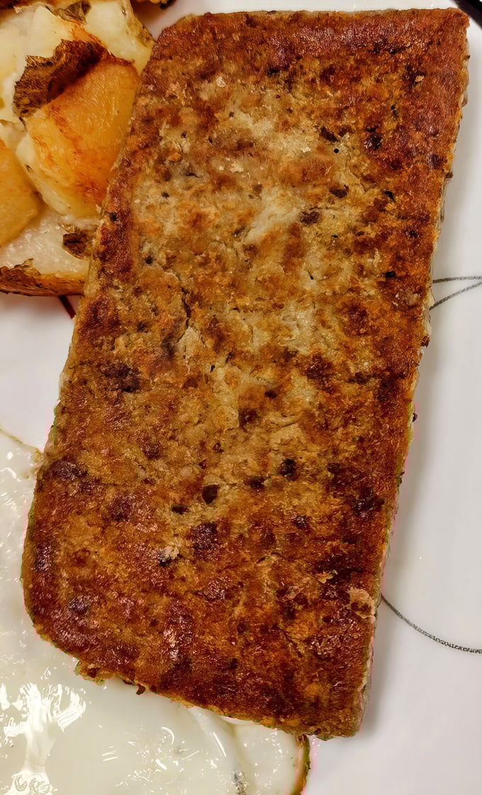 Scrapple: Pennsylvania's answer to "what should we do with these pork parts?" Crispy, savory, and unapologetically delicious.
