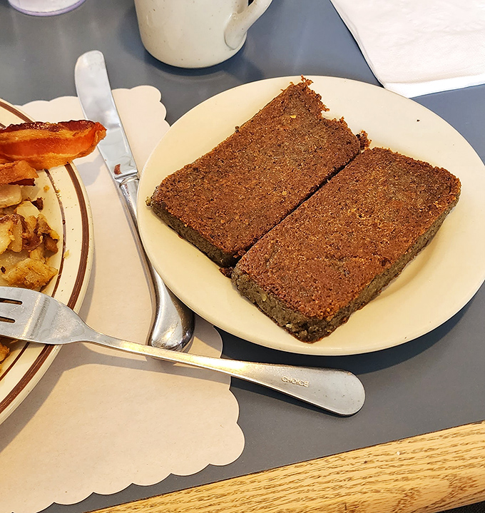 Scrapple: Delaware's breakfast of champions. Two perfectly crisped slices ready to convert even the most skeptical out-of-stater.