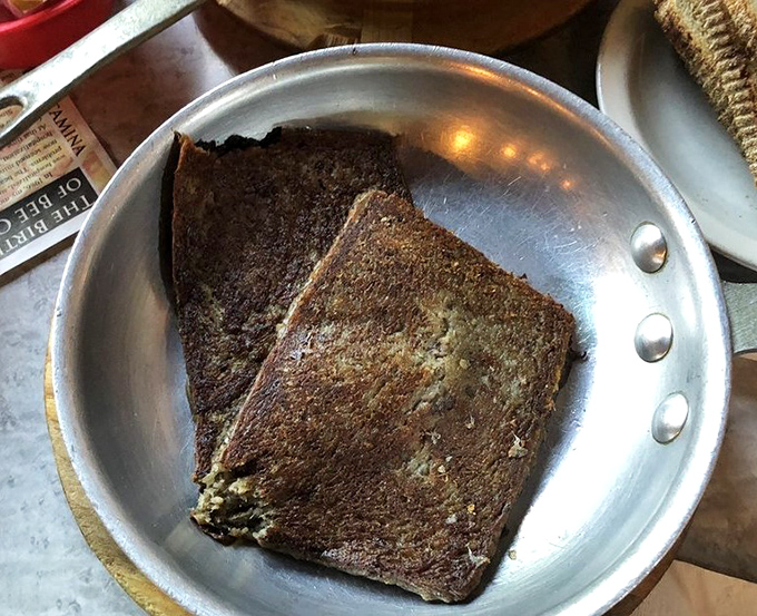 Scrapple: the breakfast food that requires courage the first time and creates addiction every time after. Crispy outside, tender inside&mdash;Pennsylvania on a plate.