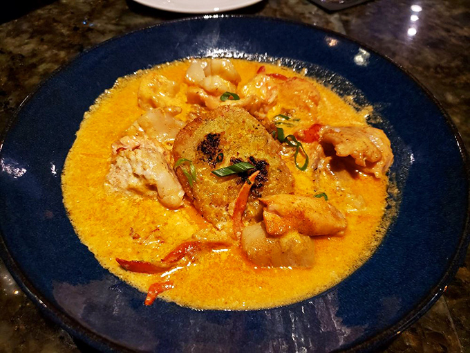 This seafood pan roast delivers oceanic comfort in a bowl, like a warm hug from Neptune's own kitchen.