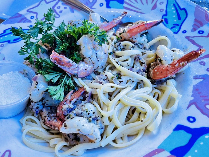 Plump shrimp lounging on a bed of linguine like they're at a pasta spa. The fresh parsley isn't just garnish&mdash;it's the green light signaling "devour immediately."