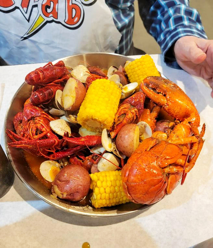 A seafood summit where crawfish, lobster, clams, and corn hold an important meeting about how to make your taste buds dance with joy.