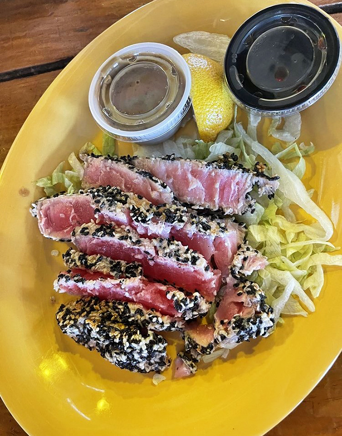 Sesame-crusted tuna, seared rare and sliced like jewels&mdash;proof that sometimes the simplest preparations showcase the ocean's bounty most eloquently.