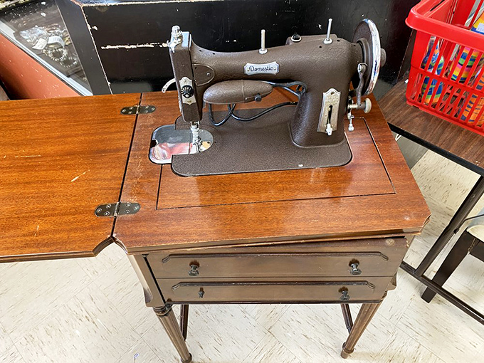 This vintage Domestic sewing machine isn't just furniture; it's a time machine to when "homemade" wasn't a luxury but a necessity.