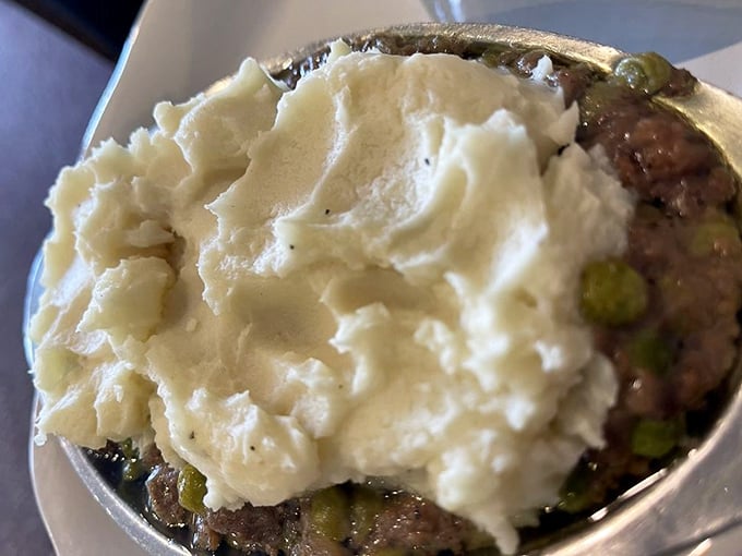 Shepherd's pie that would make actual shepherds abandon their flocks &ndash; a bubbling cauldron of savory goodness topped with cloud-like mashed potatoes.