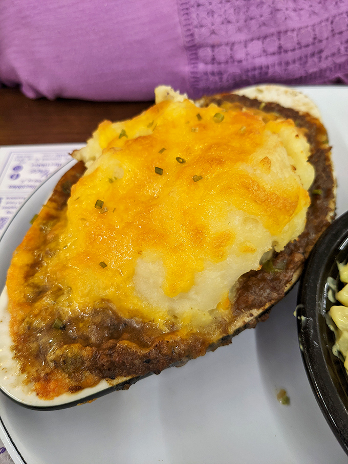 This isn't your cafeteria shepherd's pie &ndash; it's a golden-topped comfort bomb with cheese that stretches like it's auditioning for a pizza commercial.