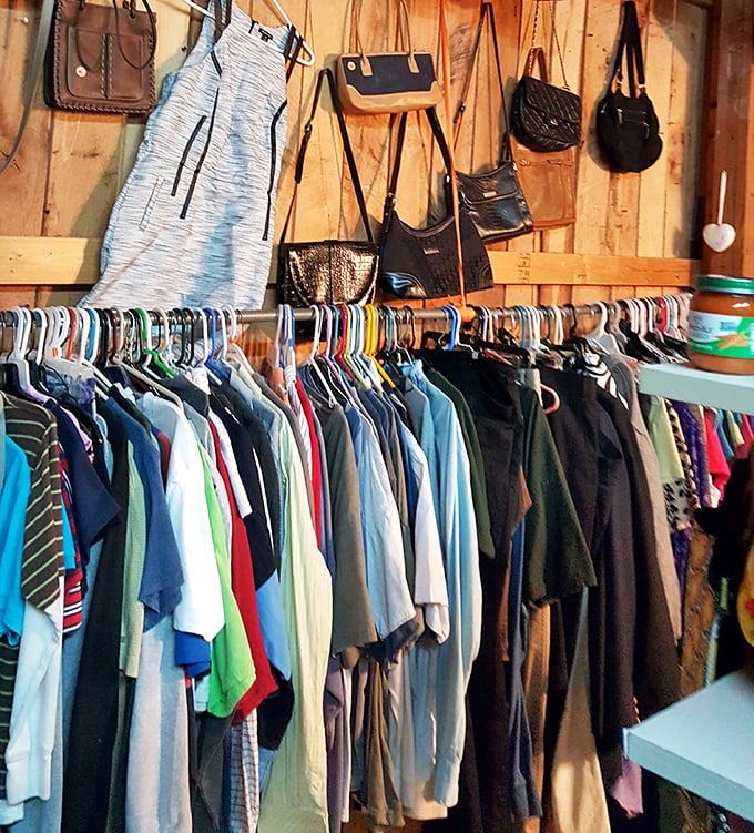 The clothing section reveals a carefully curated chaos where vintage tees hang alongside barely-worn designer pieces, all waiting for their second chance at fashion glory.