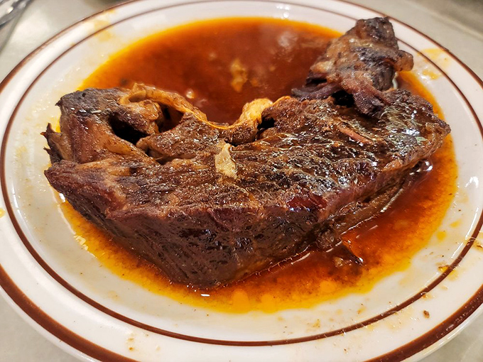 These short ribs aren't just falling off the bone&mdash;they're practically filing for independence in a pool of savory jus.