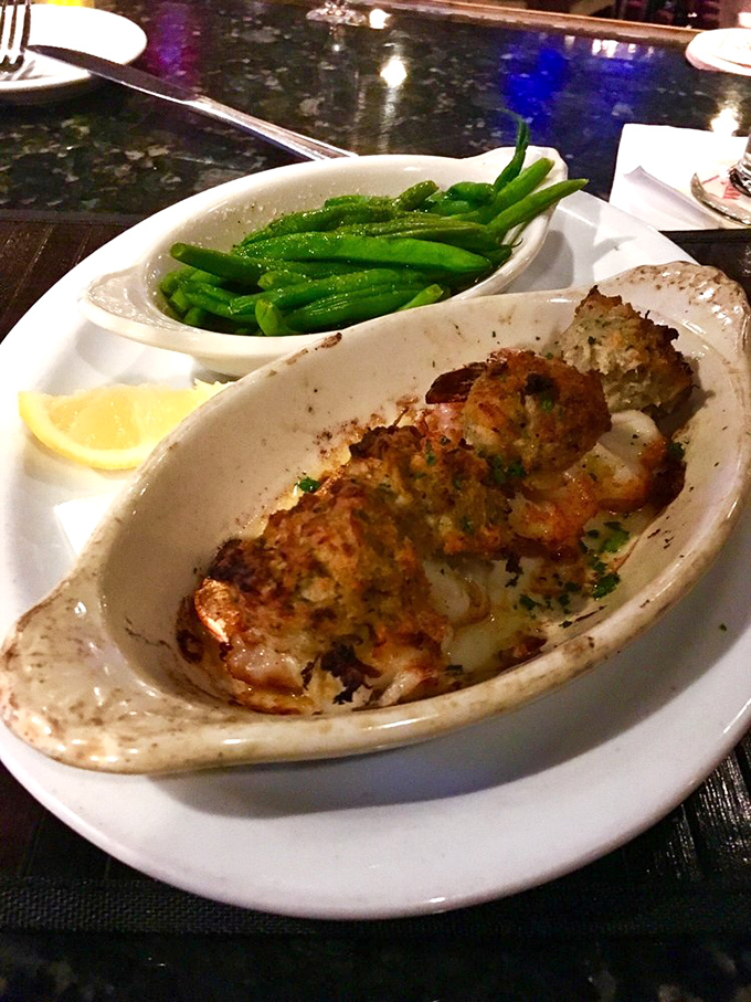 Stuffed shrimp that would make Neptune himself jealous, paired with vibrant green beans. The ocean's treasures, thoughtfully prepared.