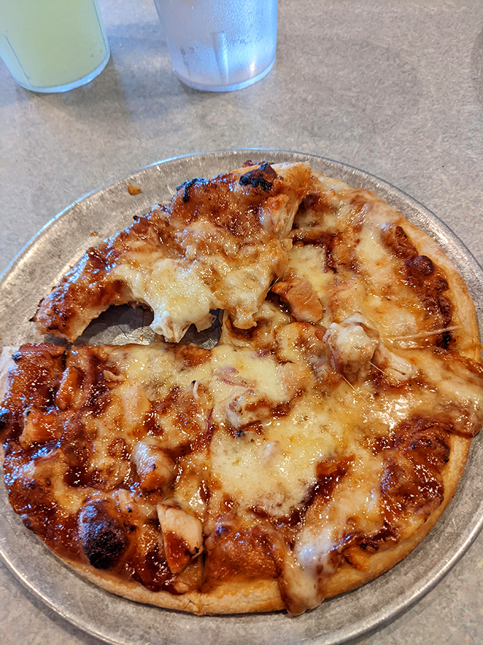 BBQ chicken pizza with that signature swirl of sauce on top&mdash;breaking pizza rules in all the right ways.