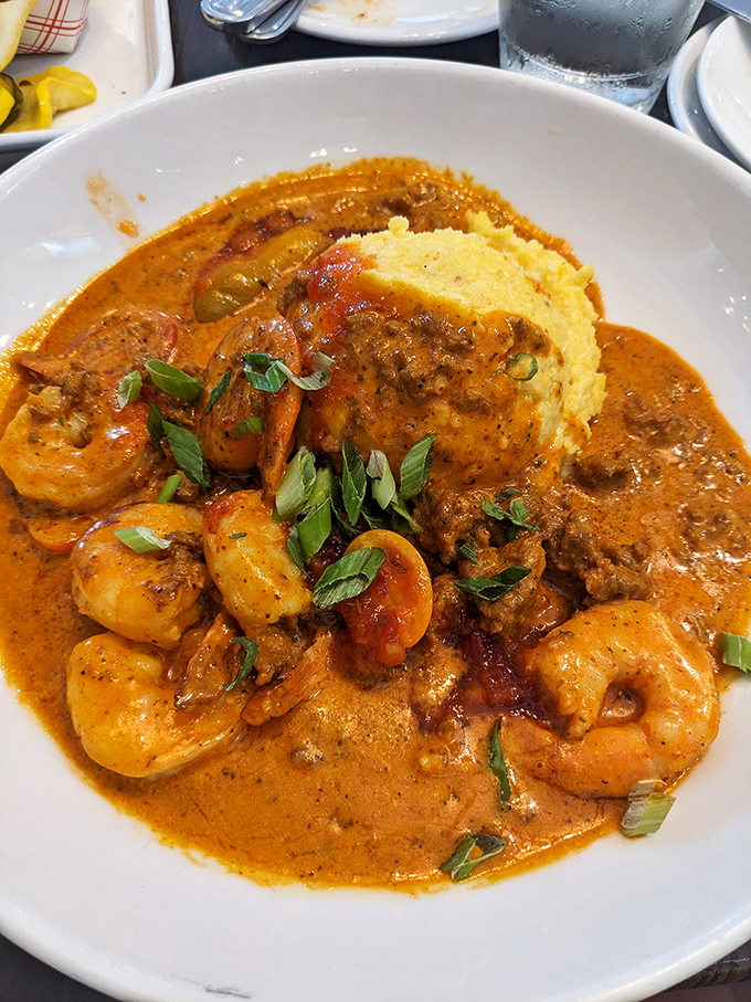 Shrimp and grits: where Southern comfort meets coastal luxury in a spicy, creamy embrace that would make both your cardiologist and taste buds take notice.