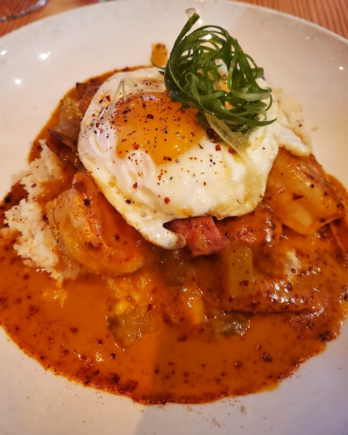 Comfort food elevated to art form &ndash; a sunny-side egg crowns this hearty dish like a culinary halo. Your grandmother would approve, then ask for seconds.