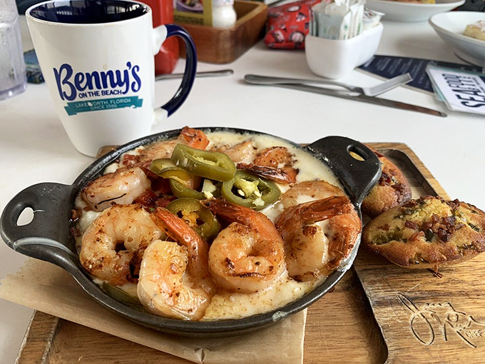 Shrimp and grits with jalapeños—where creamy Southern comfort meets Florida seafood in a cast-iron skillet love affair.