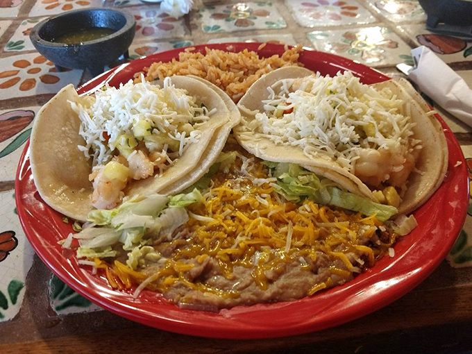 Shrimp tacos that make you question every other taco decision you've ever made. The seafood-to-cheese ratio here is what mathematicians call "the golden proportion."