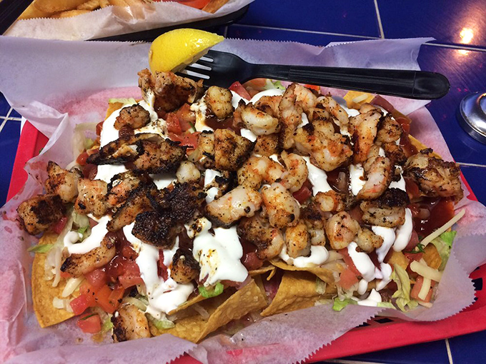 Shrimp nachos that make you question why you ever settled for just cheese and chips. The ocean and Mexico had a delicious love child.