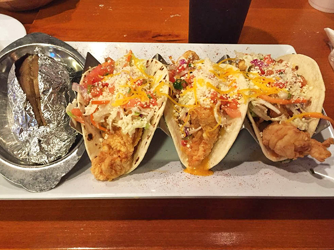 Tacos that make you question every other taco you've ever eaten. That seafood is practically waving hello from its tortilla hammock.