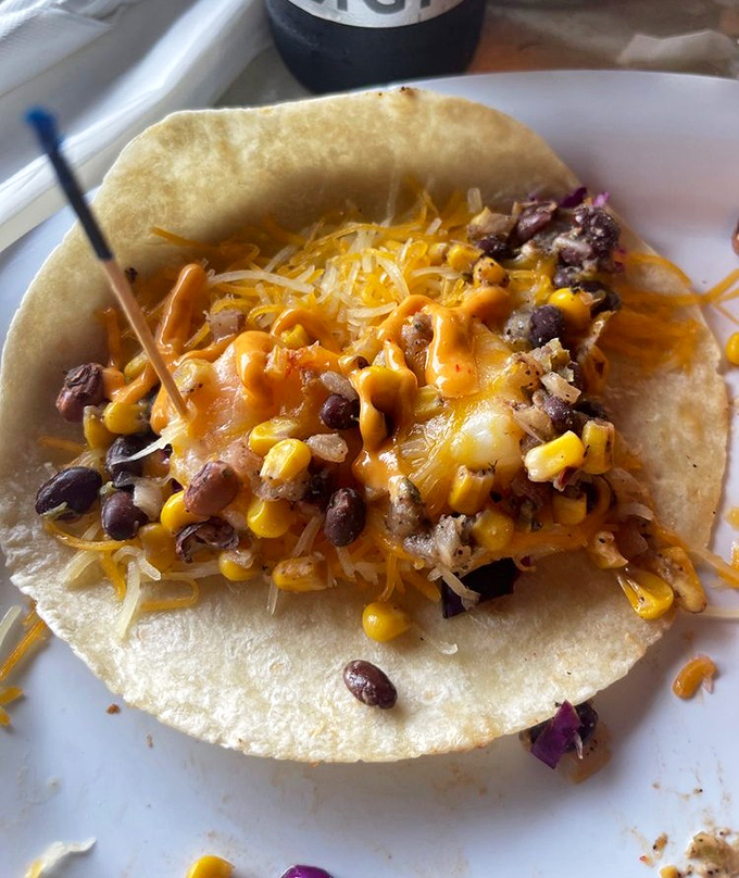 Southwest meets seafood in these loaded tacos. When corn, beans, and cheese join forces with fresh fish, everybody wins.
