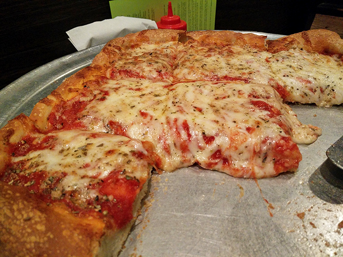 Sicilian-style pizza that demands respect&mdash;thick, square, and unapologetically indulgent. The corner piece is worth fighting for.