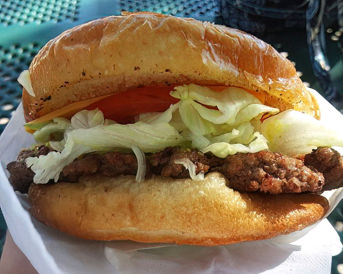 Behold the single cheeseburger in its natural habitat&mdash;a study in proportion where beef, cheese, and veggies achieve a harmony that fancy restaurants spend years trying to perfect.