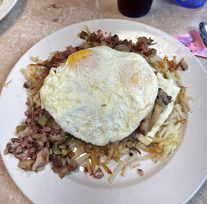 The breakfast skillet &ndash; where hash browns, meat, veggies, and eggs unite in perfect harmony. It's the breakfast equivalent of The Beatles getting back together.