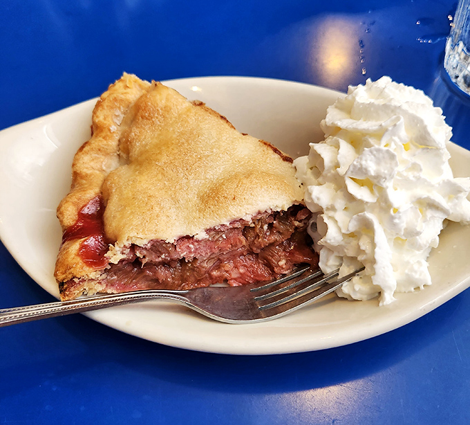 Cherry pie that makes you understand why Agent Cooper was so obsessed—that crimson filling peeking through golden crust is pure Americana.