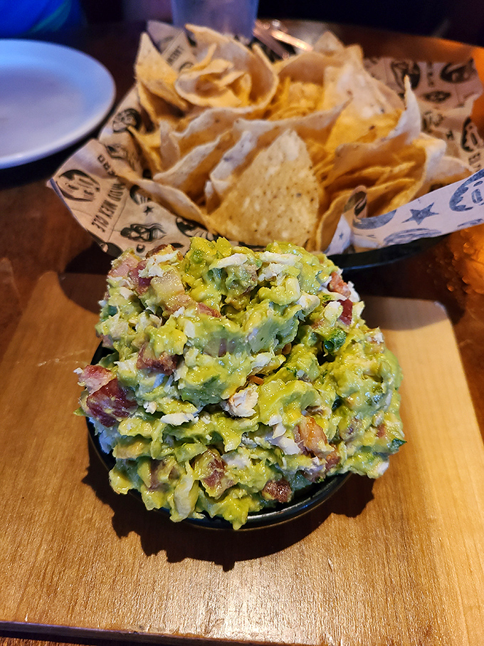Guacamole elevated from simple dip to table centerpiece&mdash;a vibrant, chunky mountain of avocado goodness that demands respectful demolition.