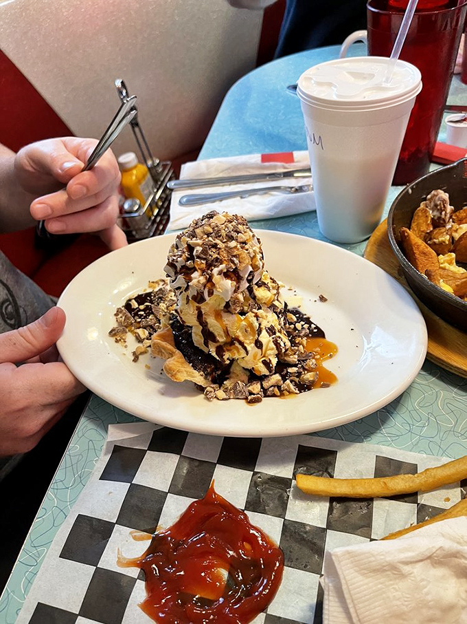 This isn't just dessert&mdash;it's therapy on a plate. Ice cream, chocolate, caramel, and nuts creating a symphony that makes adult problems temporarily vanish.