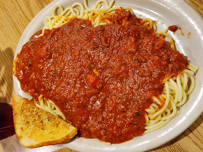 Spaghetti with meat sauce and garlic bread &ndash; proof that sometimes the classics endure because they're simply, undeniably satisfying. 
