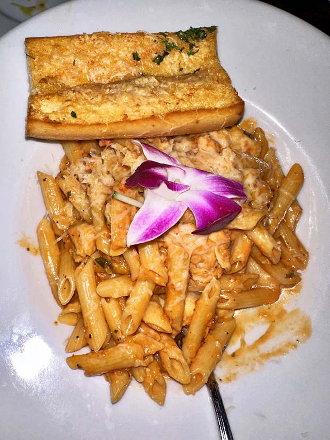 Their spicy seafood pasta &ndash; where penne meets the sea in a creamy liaison that would make Neptune himself put down his trident and pick up a fork.