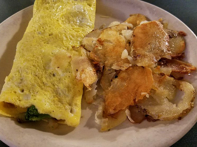 The omelet &ndash; fluffy, golden, and substantial enough to fuel you through even the most demanding morning meetings.