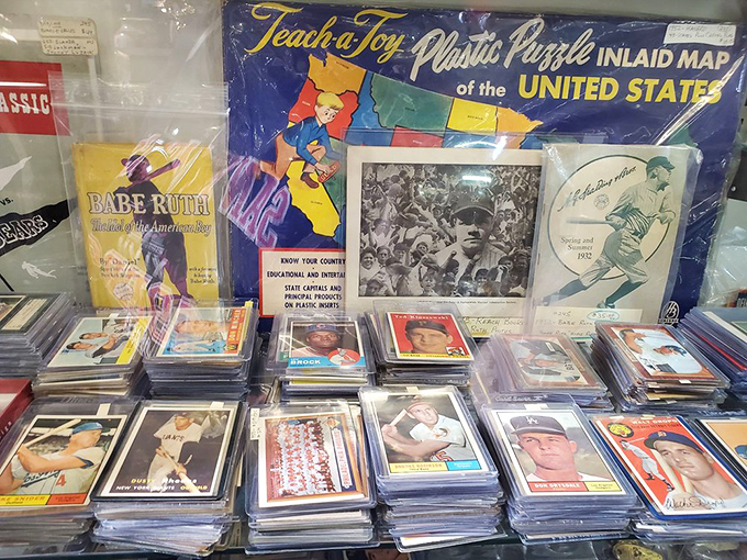 Baseball cards that captured heroes mid-swing, alongside a "Teach-a-Toy" map from when kids learned geography without Google. America's pastimes, preserved.