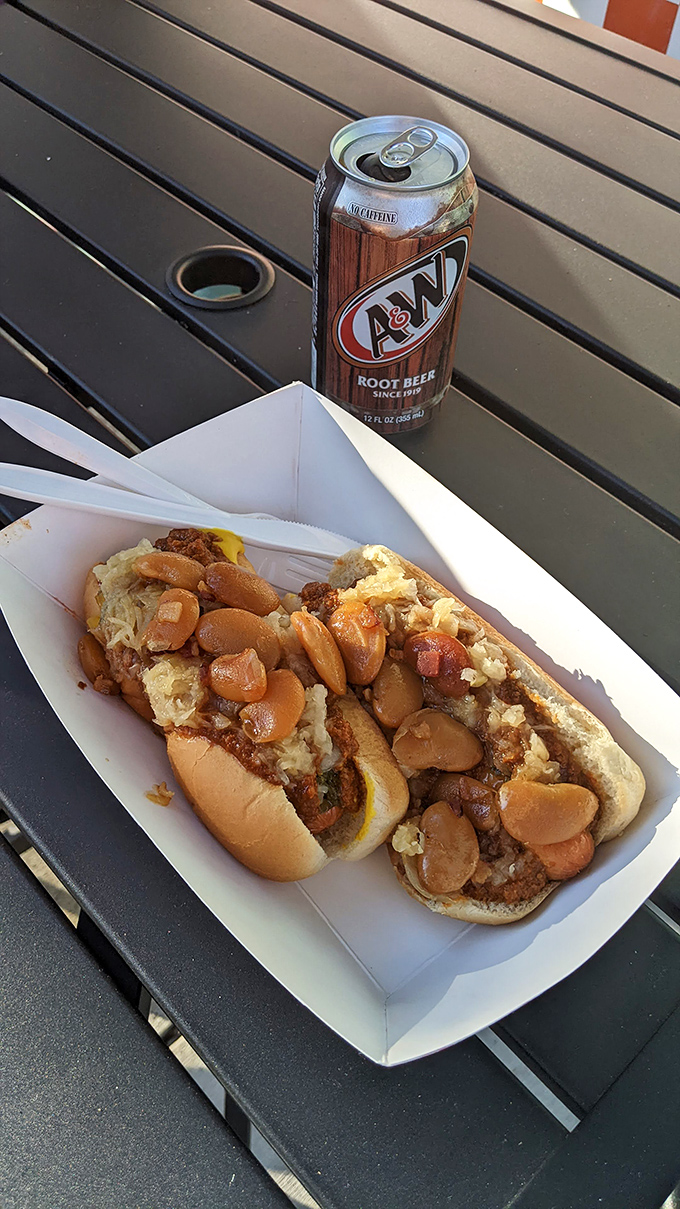 The legendary Squeeze Dog with beans and sauerkraut paired with an A&W. This isn't just lunch&mdash;it's a Pennsylvania culinary institution on a paper plate.