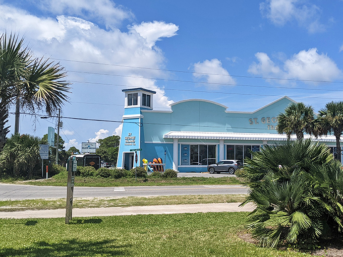 The cheerful blue facade of the Trading Company welcomes visitors with everything from beach essentials to that forgotten bottle of sunscreen.