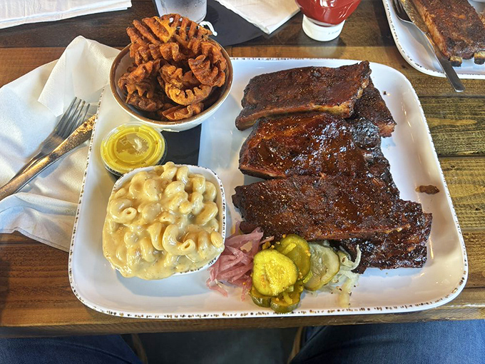 St. Louis ribs with that perfect bark, mac and cheese that's actually cheesy, and sweet potato fries&mdash;the holy trinity of barbecue happiness.