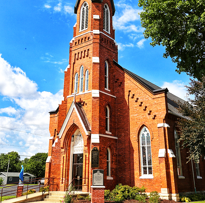 St. Mary's Catholic Church stands as a red-brick testament to faith and architectural ambition in a town where steeples still define the skyline.