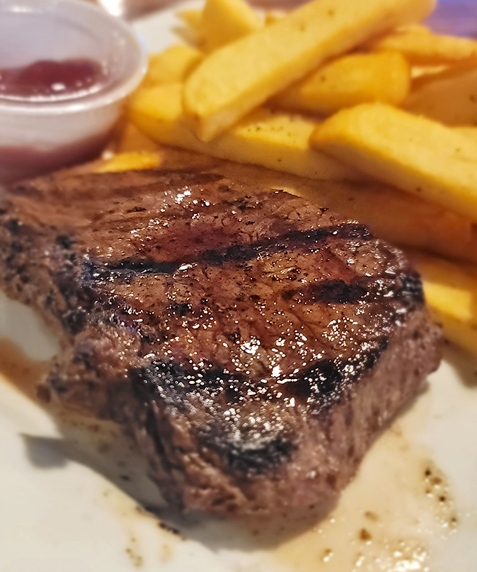This isn't just any steak &ndash; it's the kind that makes you pause mid-conversation, close your eyes, and momentarily forget your dinner companions exist.