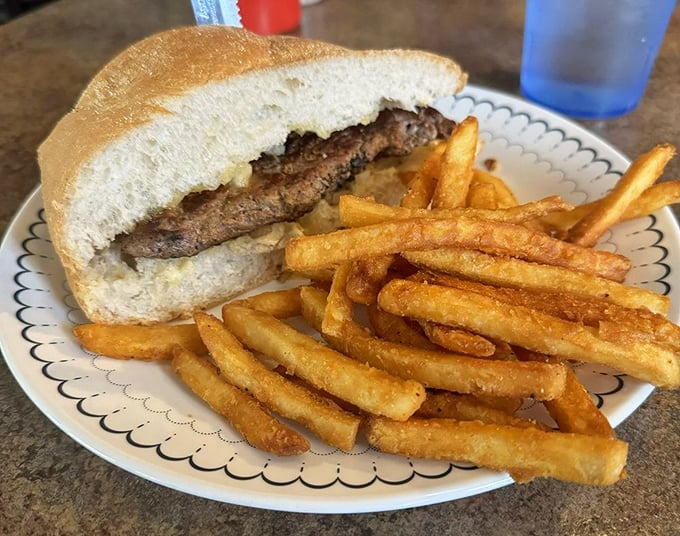Simplicity elevated to an art form&mdash;a perfectly cooked steak on a Sheboygan hard roll. Those golden fries aren't just a side; they're essential supporting actors.