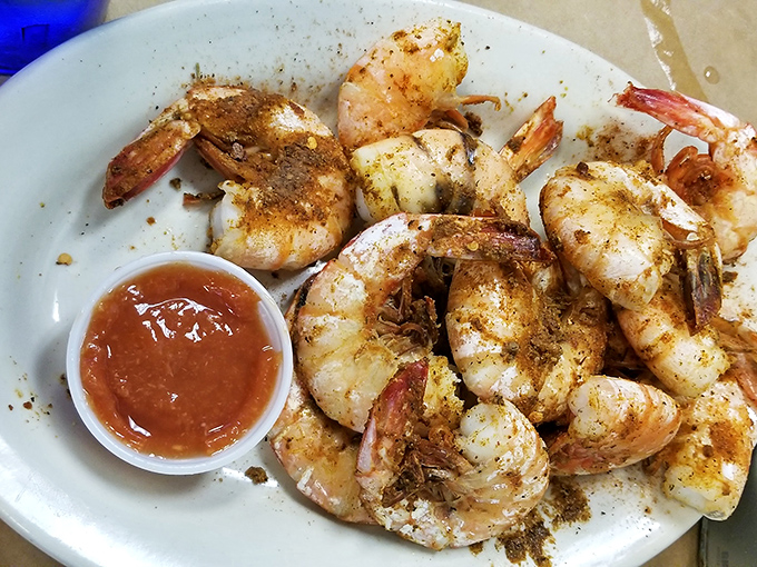 Plump, perfectly seasoned steamed shrimp that snap between your teeth. The Old Bay seasoning isn't just visible&mdash;it's practically audible. 
