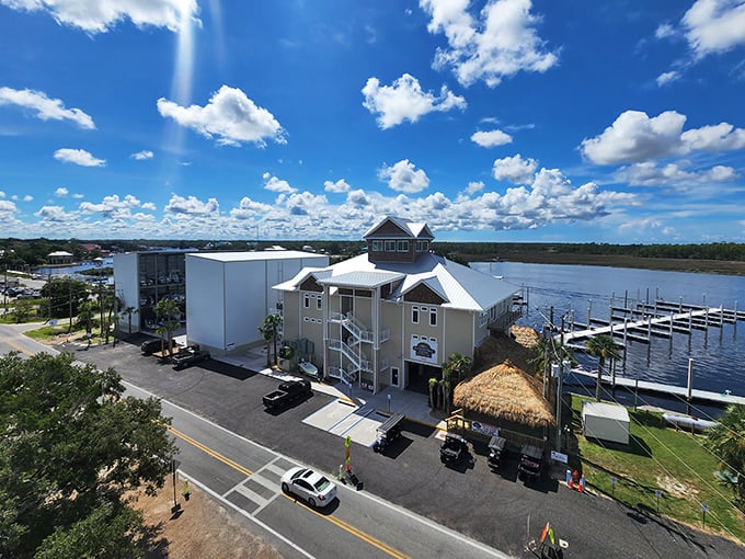The marina complex rises from the waterfront like a modern tribute to Florida's fishing village heritage.