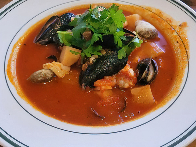 Ed's Portuguese Fish Stew brings the Atlantic to your table&mdash;a tomato-rich broth cradling tender seafood and potatoes that would make any fisherman's grandmother proud.