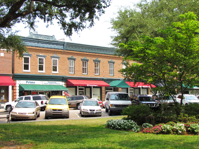 Historic buildings house modern businesses in a downtown where brick facades tell stories of generations past.