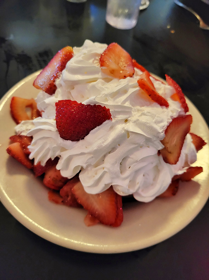 Fresh strawberries nestled in clouds of whipped cream – dessert that somehow manages to feel both indulgent and virtuous at the same time.