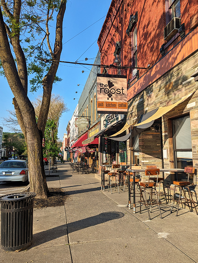 The Roost's outdoor seating invites you to people-watch while sipping coffee, a perfect front-row seat to Wellsboro's daily rhythm and small-town charm.