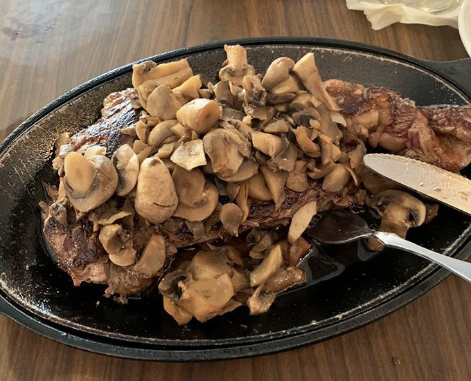 When mushrooms blanket a steak like this, vegetables suddenly don't seem like the supporting cast anymore.