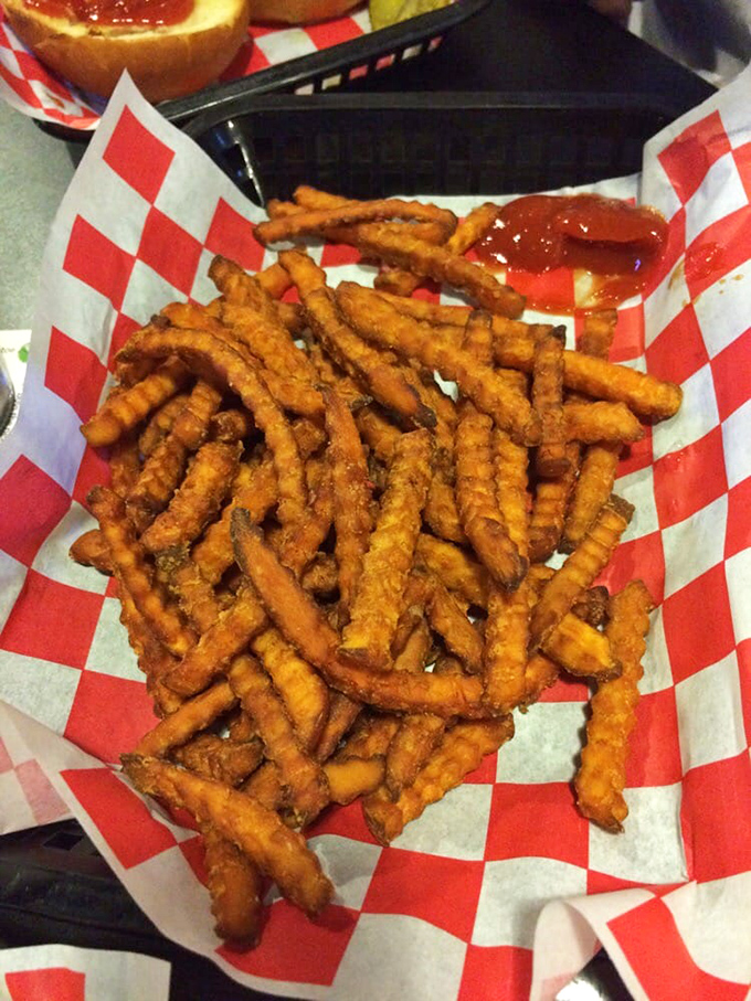 Sweet potato fries &ndash; the vegetable that successfully convinced America it could be dessert and appetizer simultaneously &ndash; served in their crispy, waffle-cut glory.