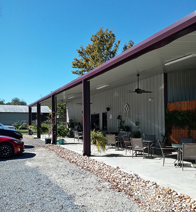 This covered patio creates the perfect spot for unhurried conversations over coffee or sweet tea, where time seems to slow to a proper Southern pace.