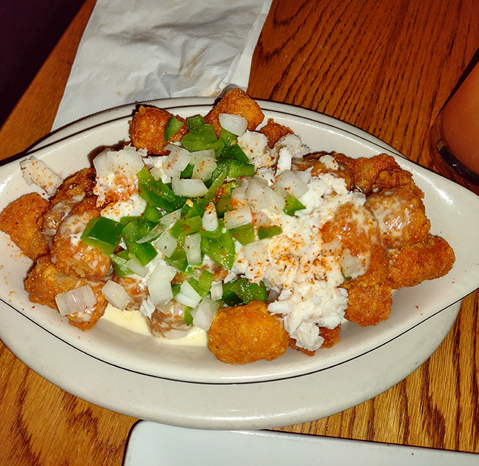 These aren't your freezer aisle tater tots&mdash;they're crispy golden nuggets crowned with cheese and green onions that make adulting suddenly worthwhile.