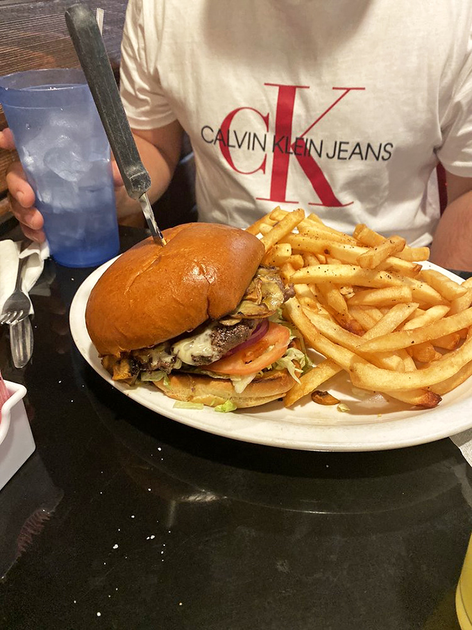 This isn't just a burger &ndash; it's edible architecture with layers of flavor stacked between a perfectly toasted bun. The fries aren't bad either!