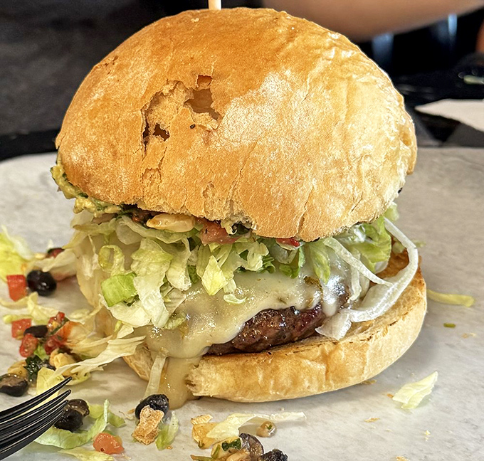 Southwest flavors meet Virginia hospitality. This burger doesn't just cross borders &ndash; it eliminates them in one delicious, messy bite.